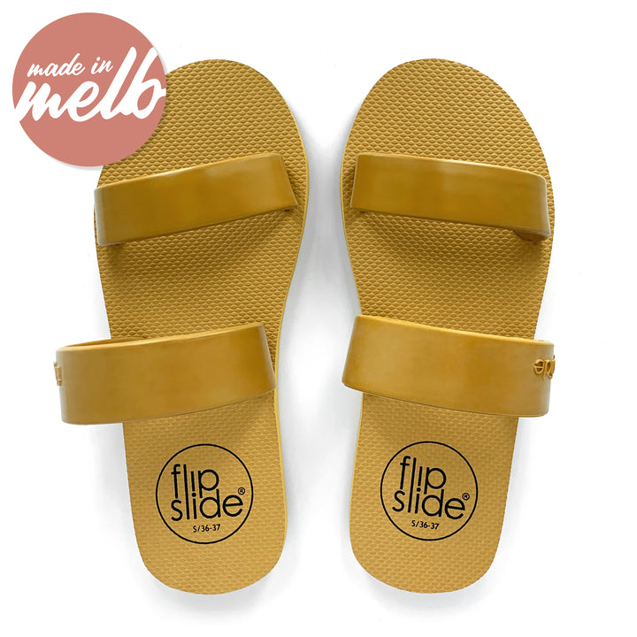 The original natural rubber flip-flop slide. – flipslide