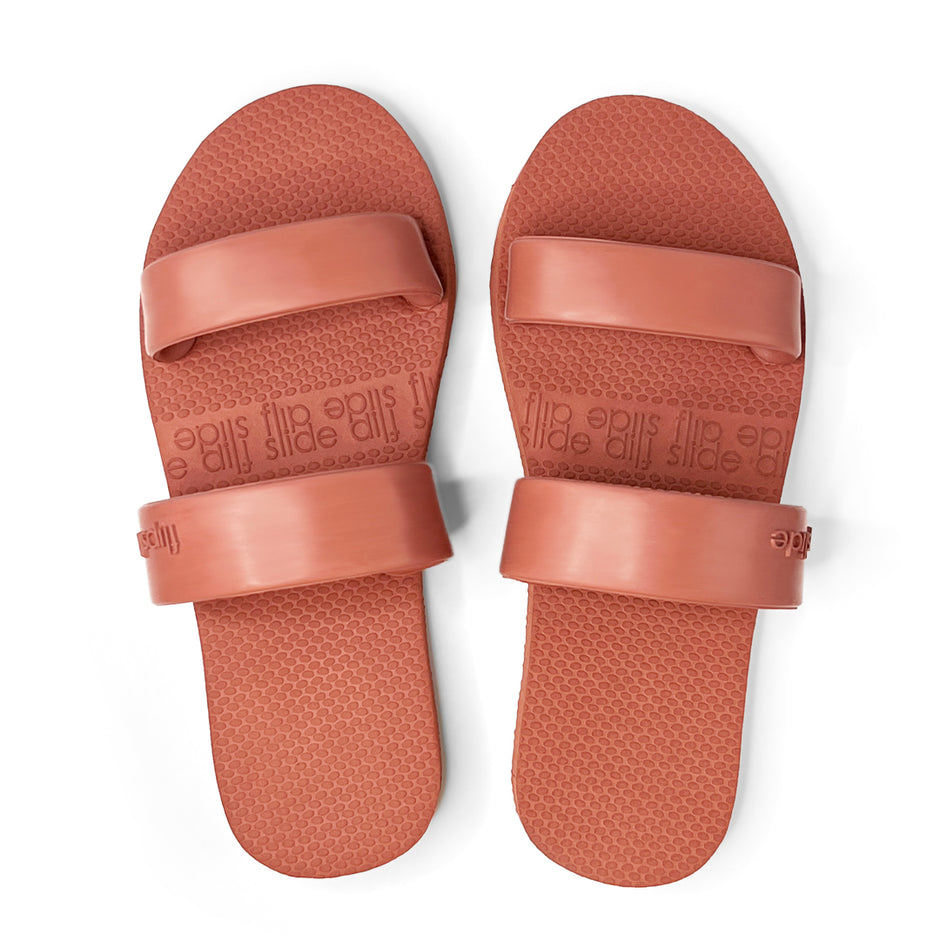 The original natural rubber flip-flop slide. – Flipslide